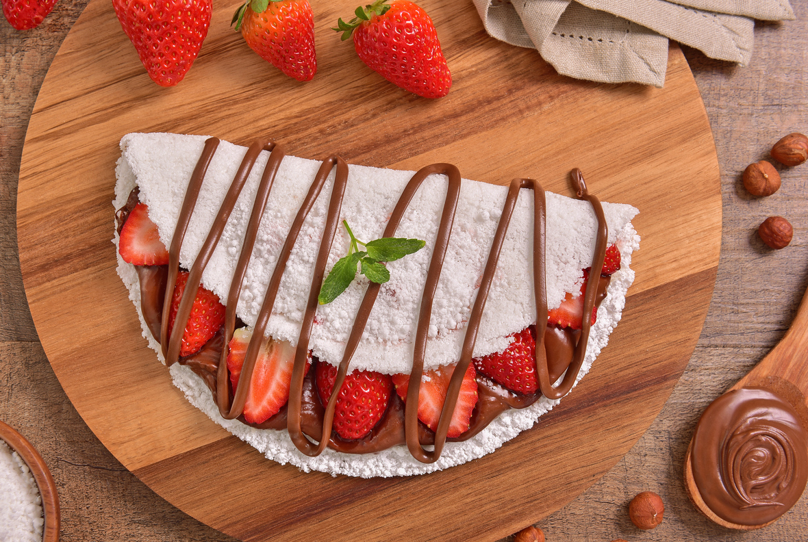 Ao ritmo brasileiro: Tapioca com creme de avelã e morangos - Women's Health